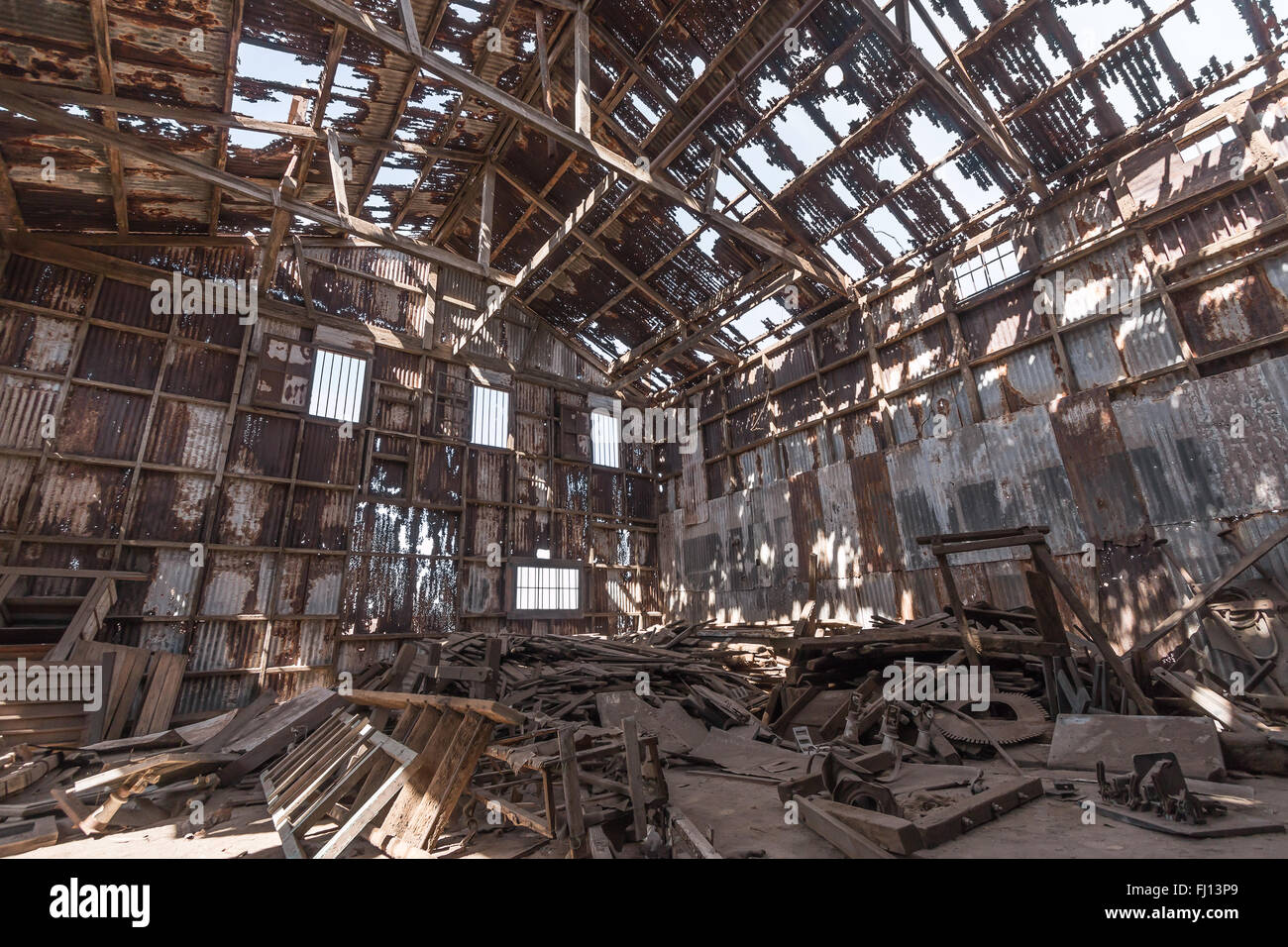 Interior of a rusting, abandoned factory at Humberstone ghost town, a ...