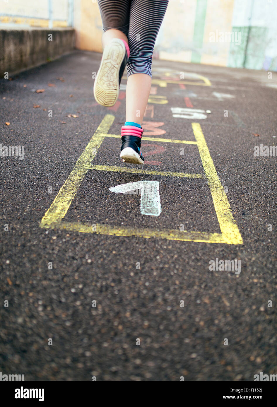Child hopping one leg hi-res stock photography and images - Alamy