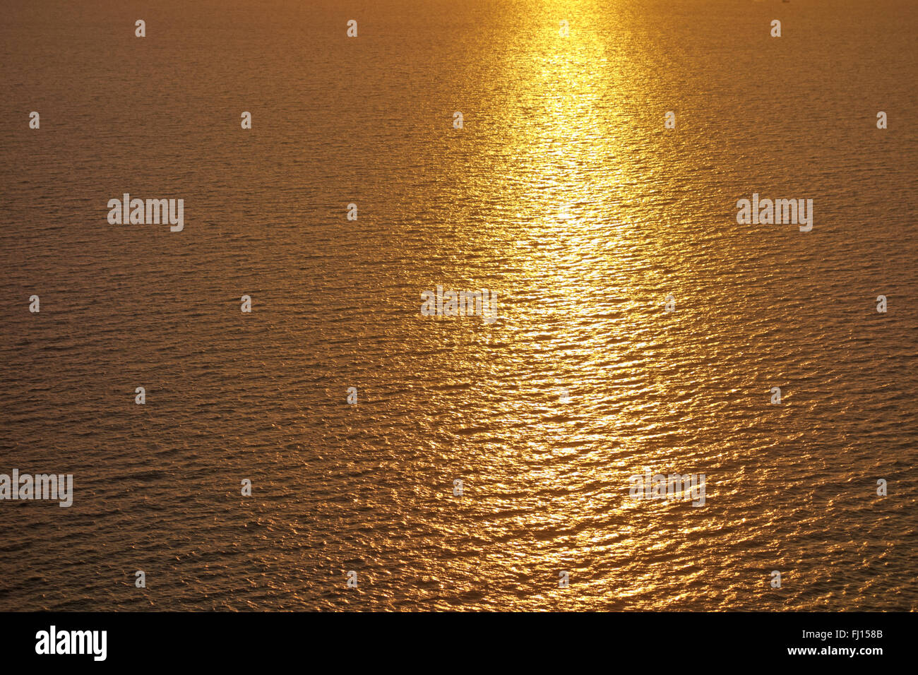 golden ocean water background Stock Photo - Alamy