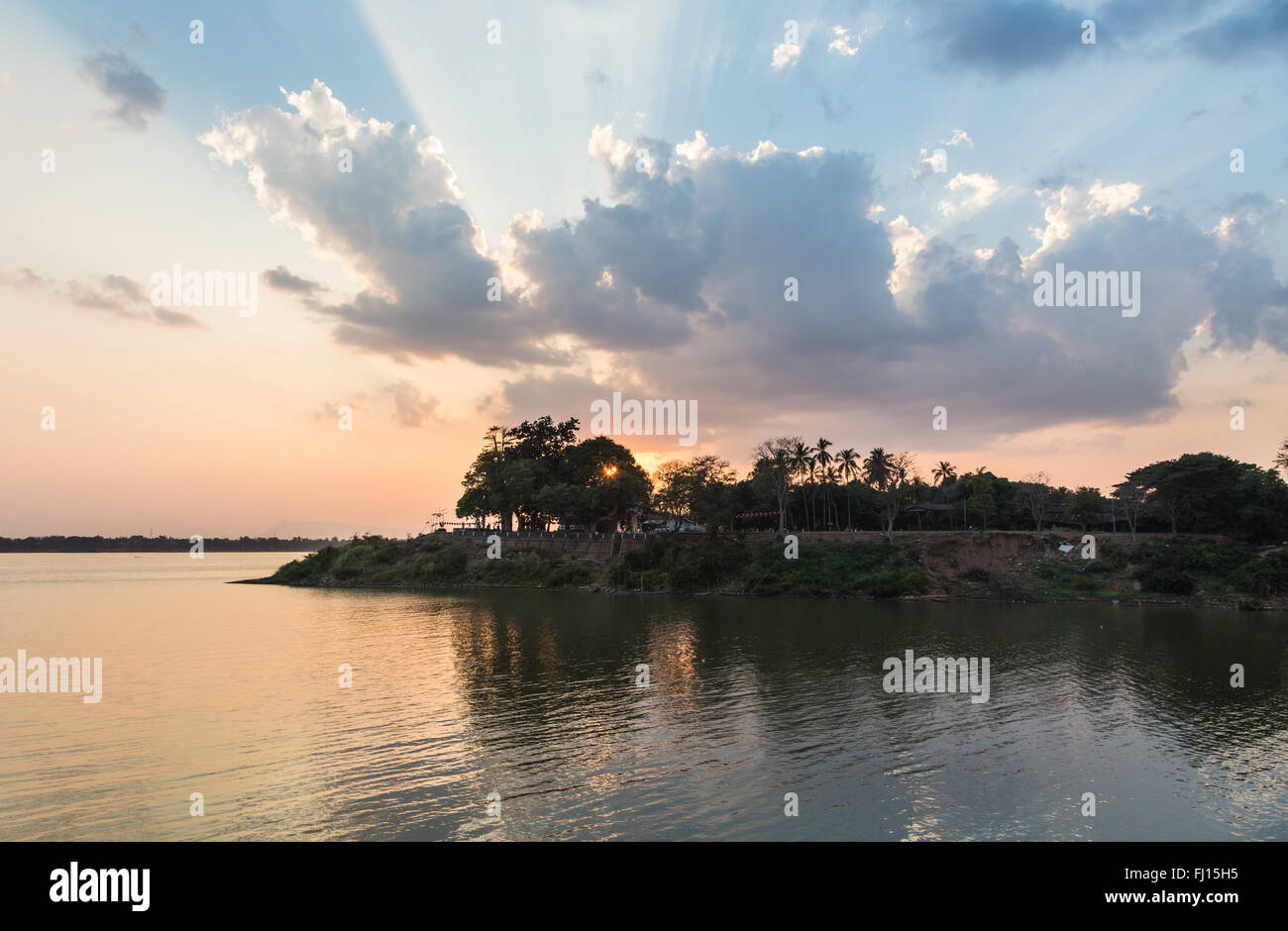Stunning sunset over the Mekong river in Pakse in Champasak province in ...
