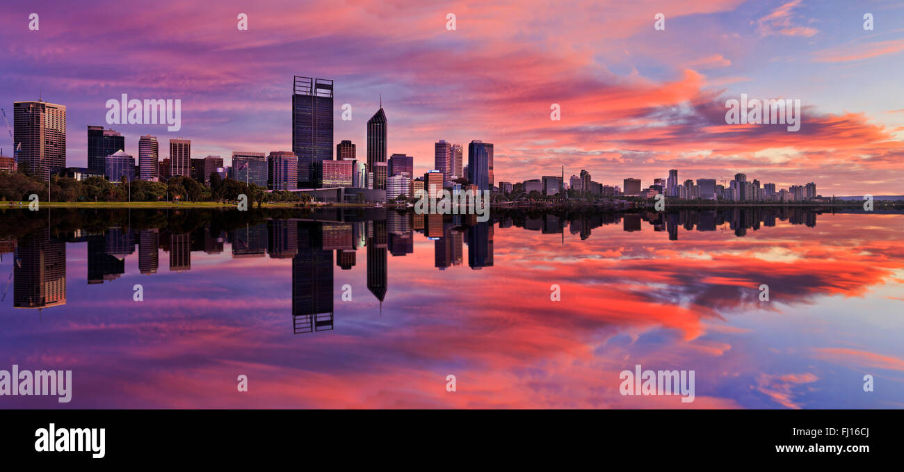 still reflection of Perth Western Australian capital at sunrise in calm ...