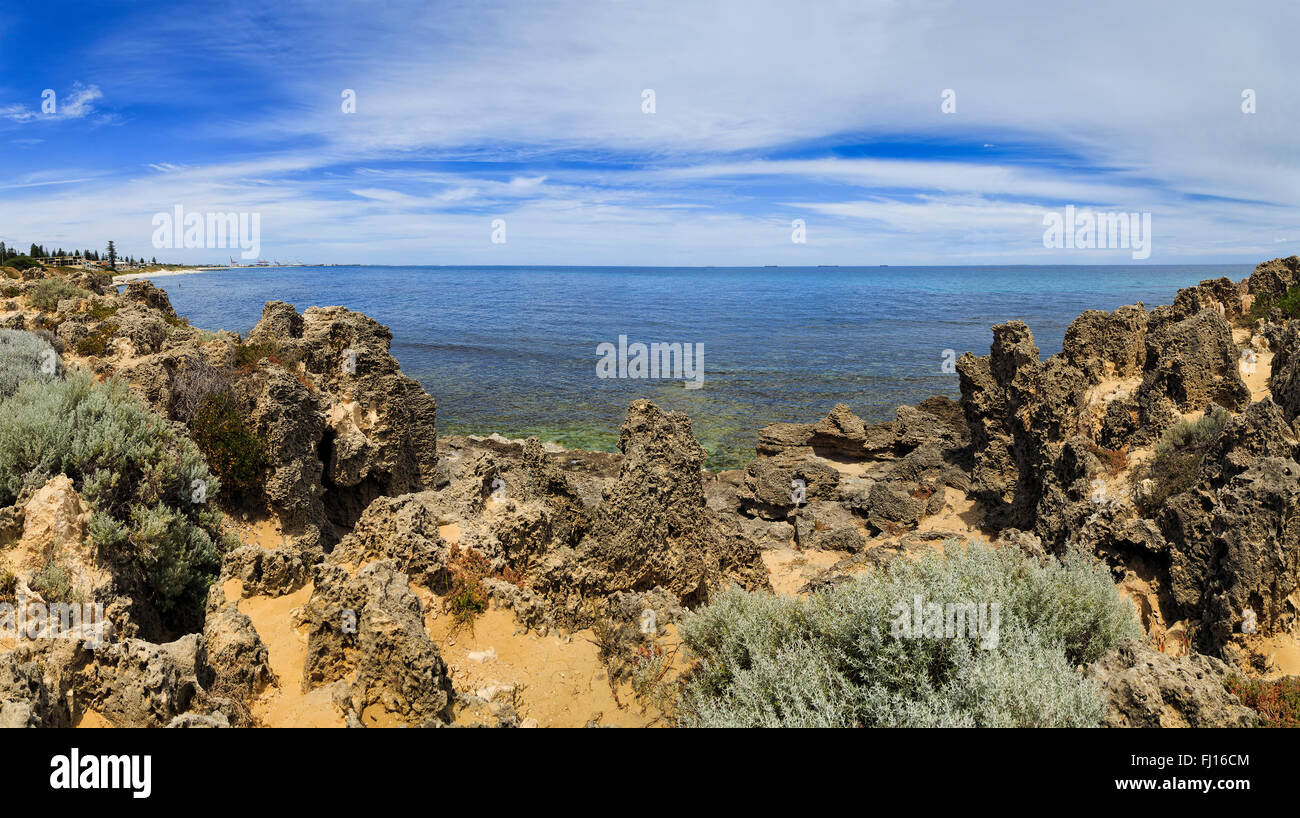 panorama of bush rocks with grass and stones at Cottlesloe beach in ...