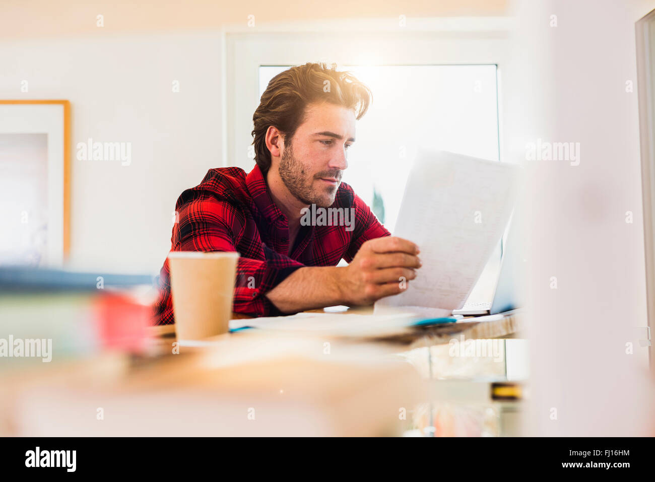 Man working in an office man working in an office hi-res stock ...