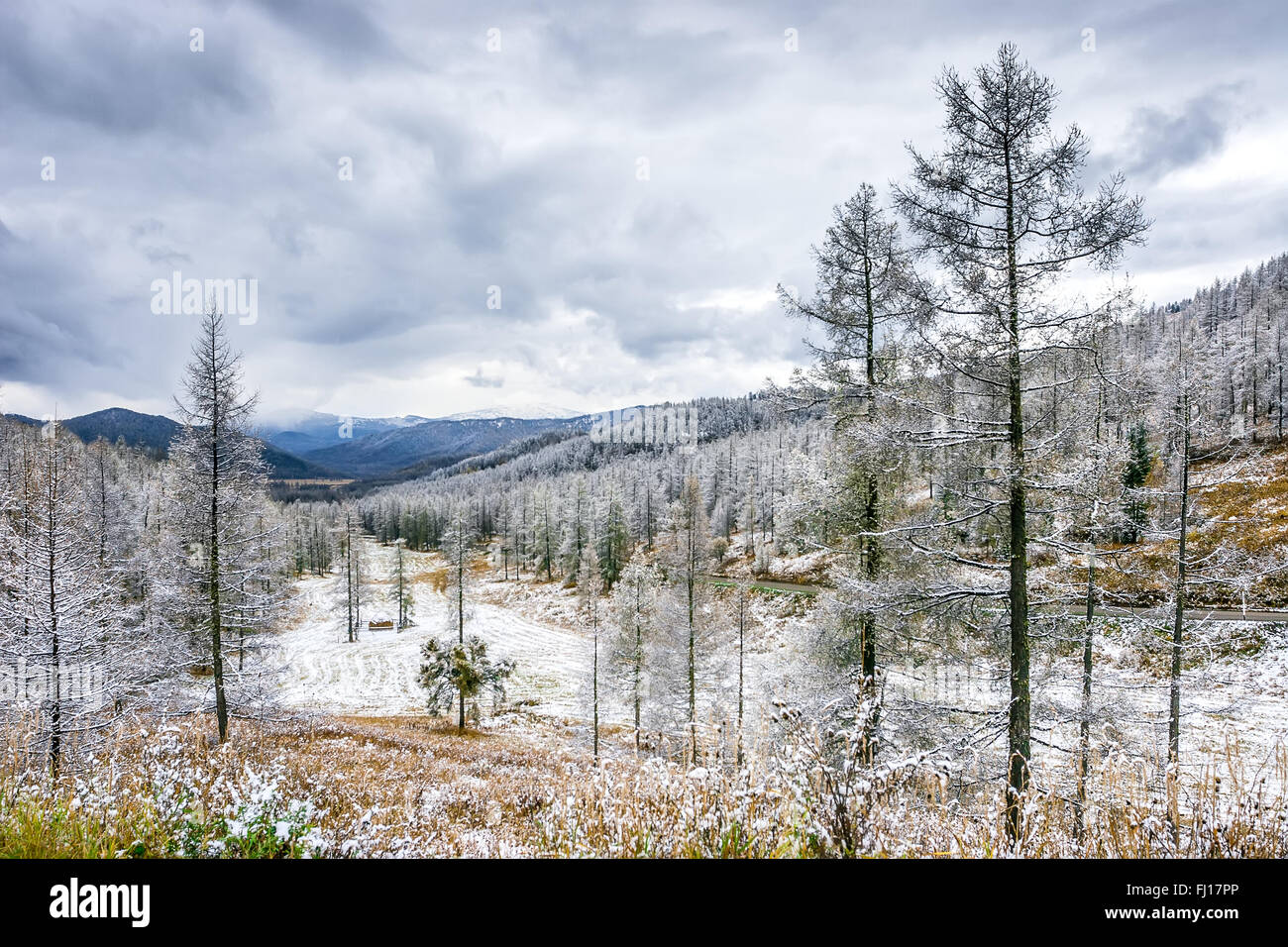 View of first snow on mountain pass Stock Photo - Alamy