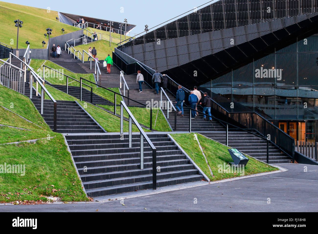 Spodek - a multipurpose arena complex in Katowice, Poland. Tourists ...