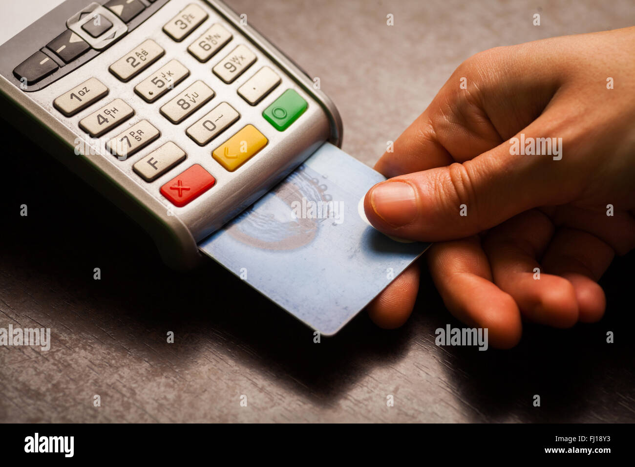 Color image of a POS and credit cards Stock Photo - Alamy