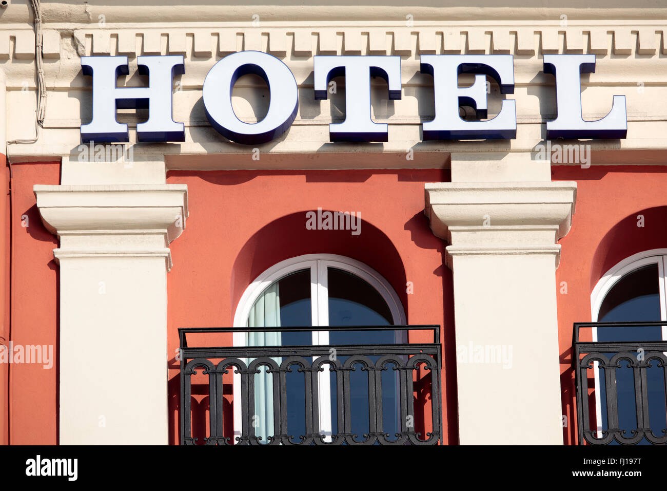 Hotel entrance sign front view Stock Photo - Alamy
