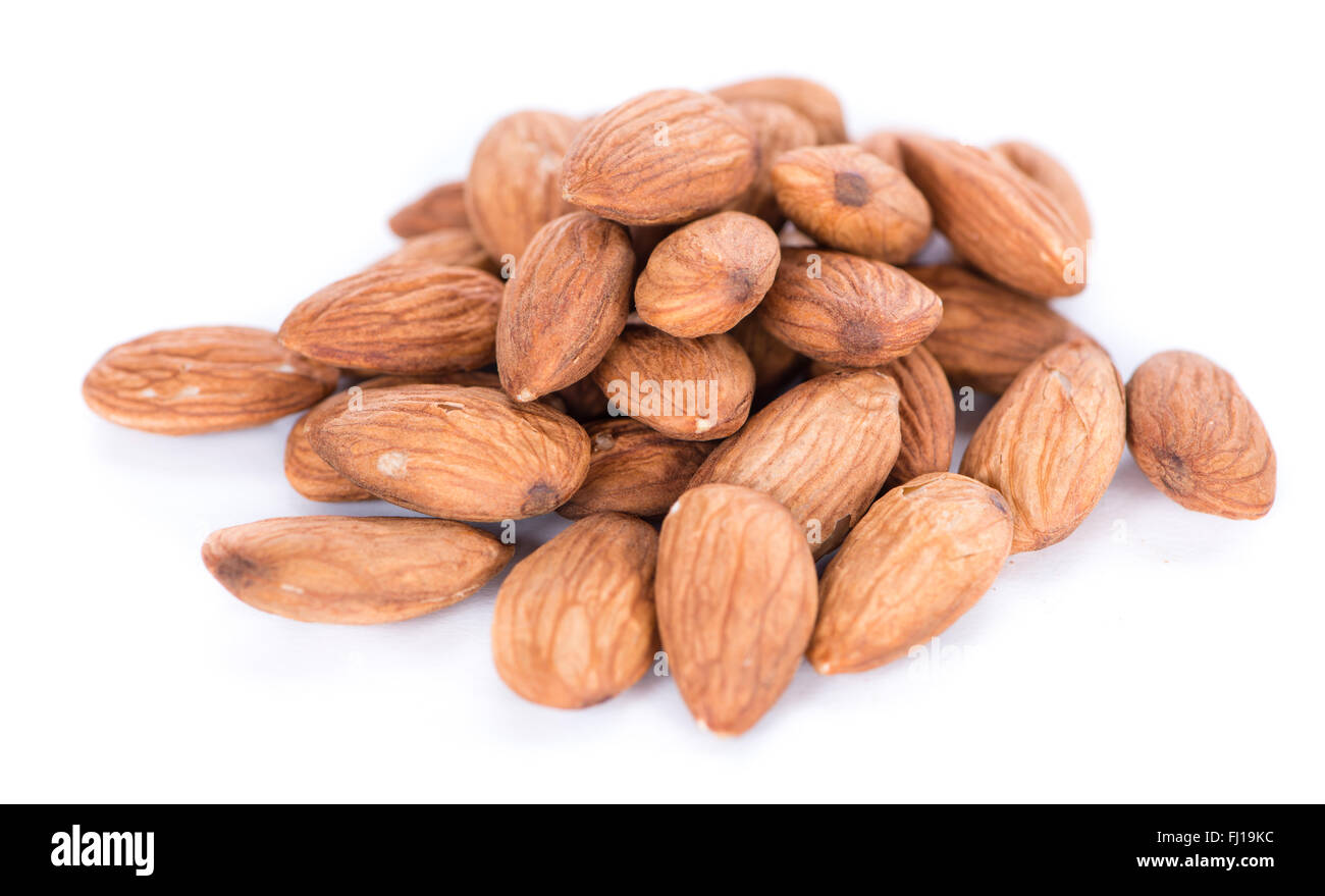 Portion of Almonds isolated on white background (close-up shot Stock ...