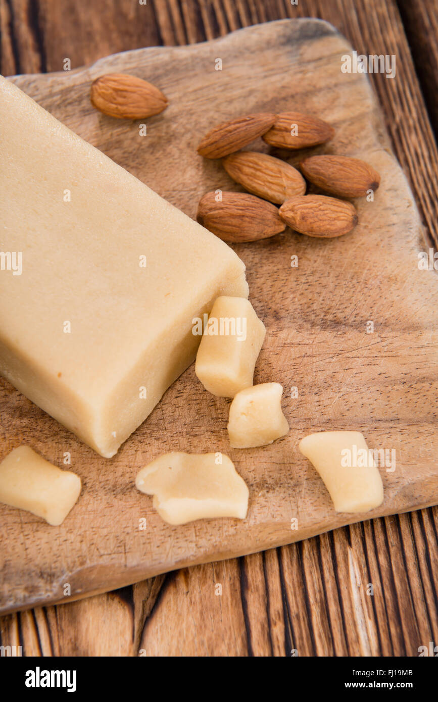 Raw Marzipan (close-up shot) on vintage wooden background Stock Photo ...