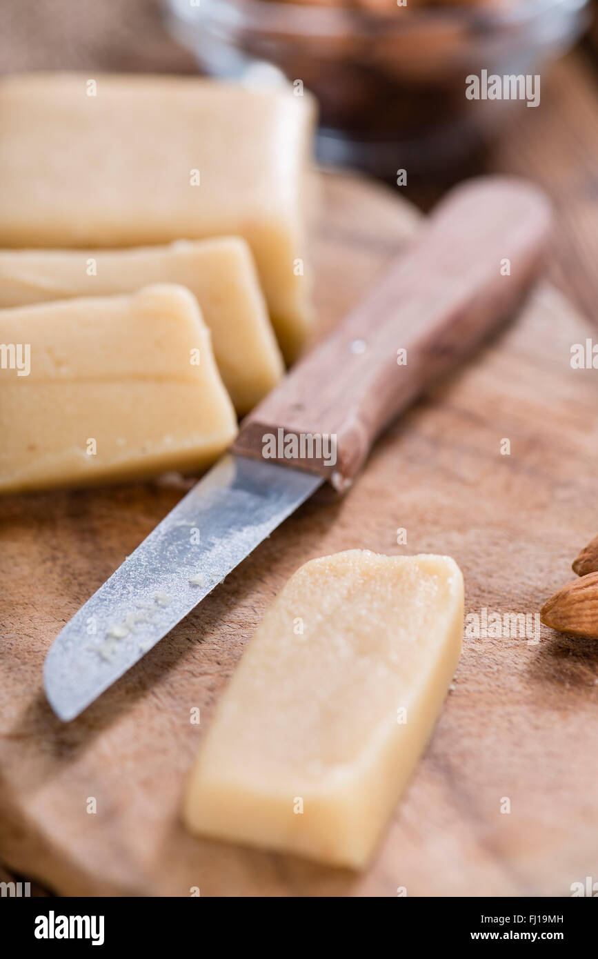Portion of Marzipan (close-up shot) on wooden background Stock Photo ...