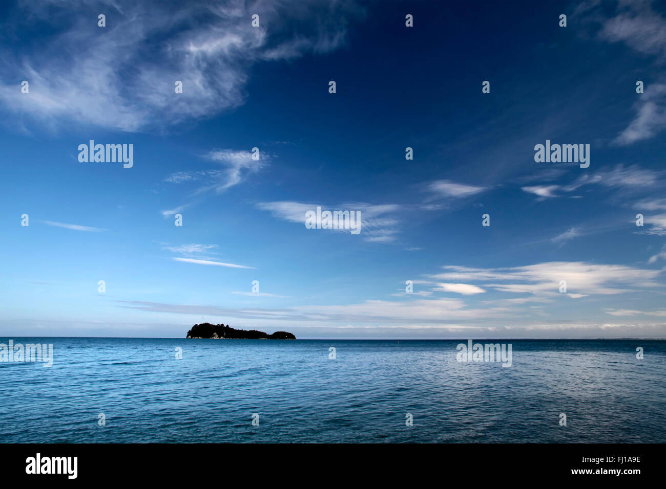 Coast line and small island in the Abel Tasman National Park, New ...