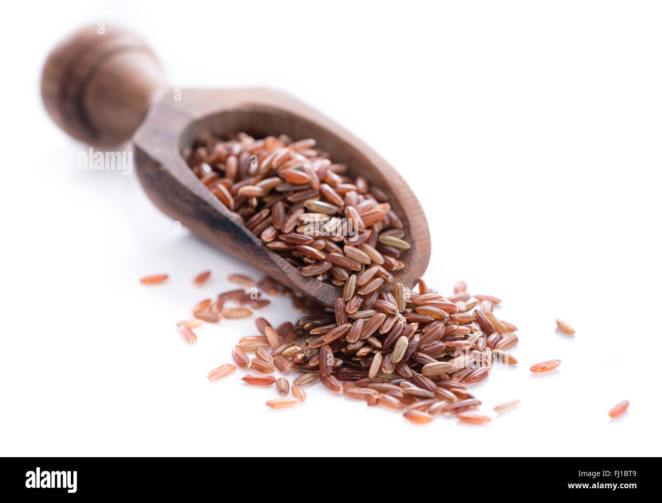 Portion of red red Rice isolated on white background (close-up shot ...