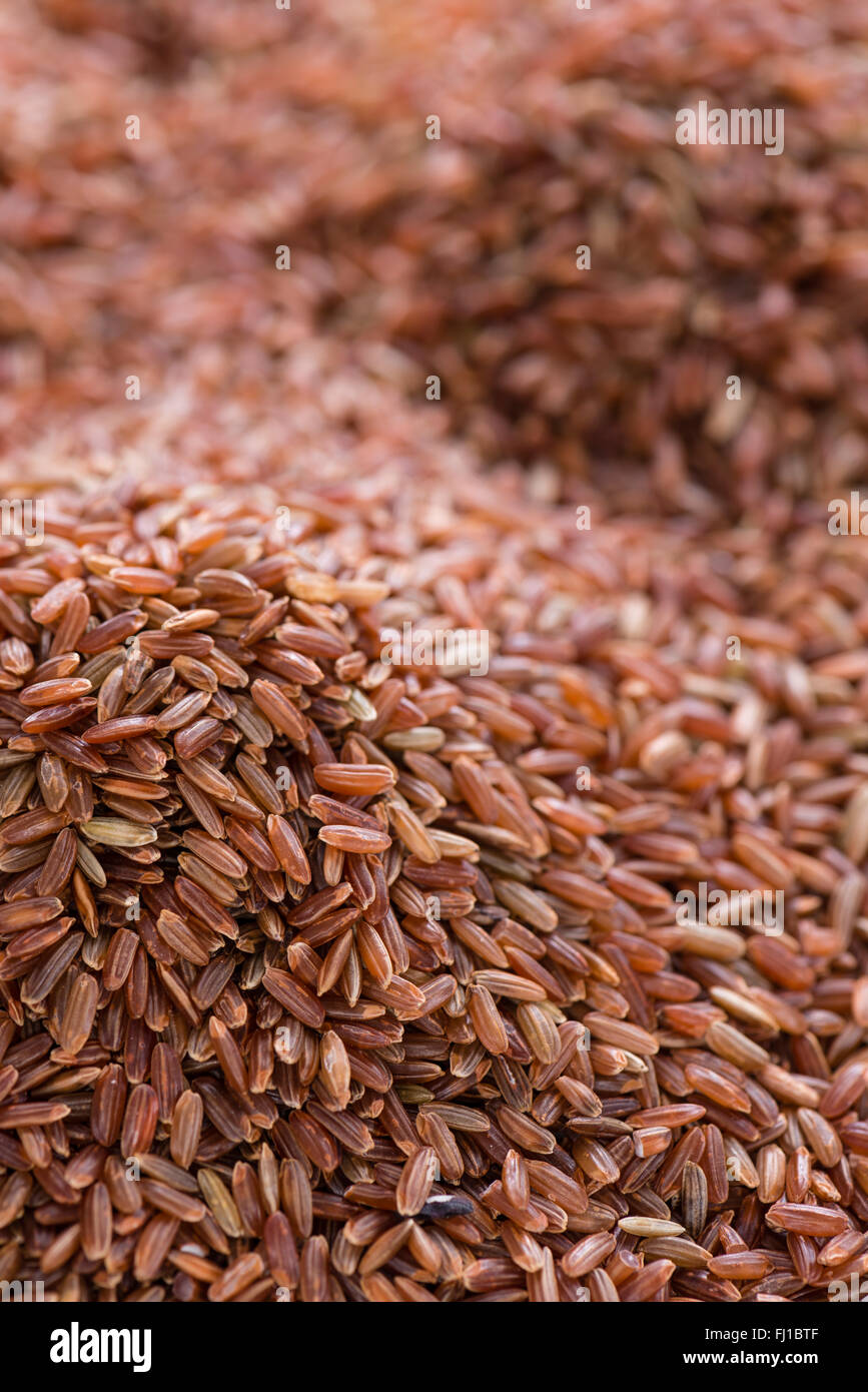 Portion of red Rice as detailed close-up shot for use as background ...