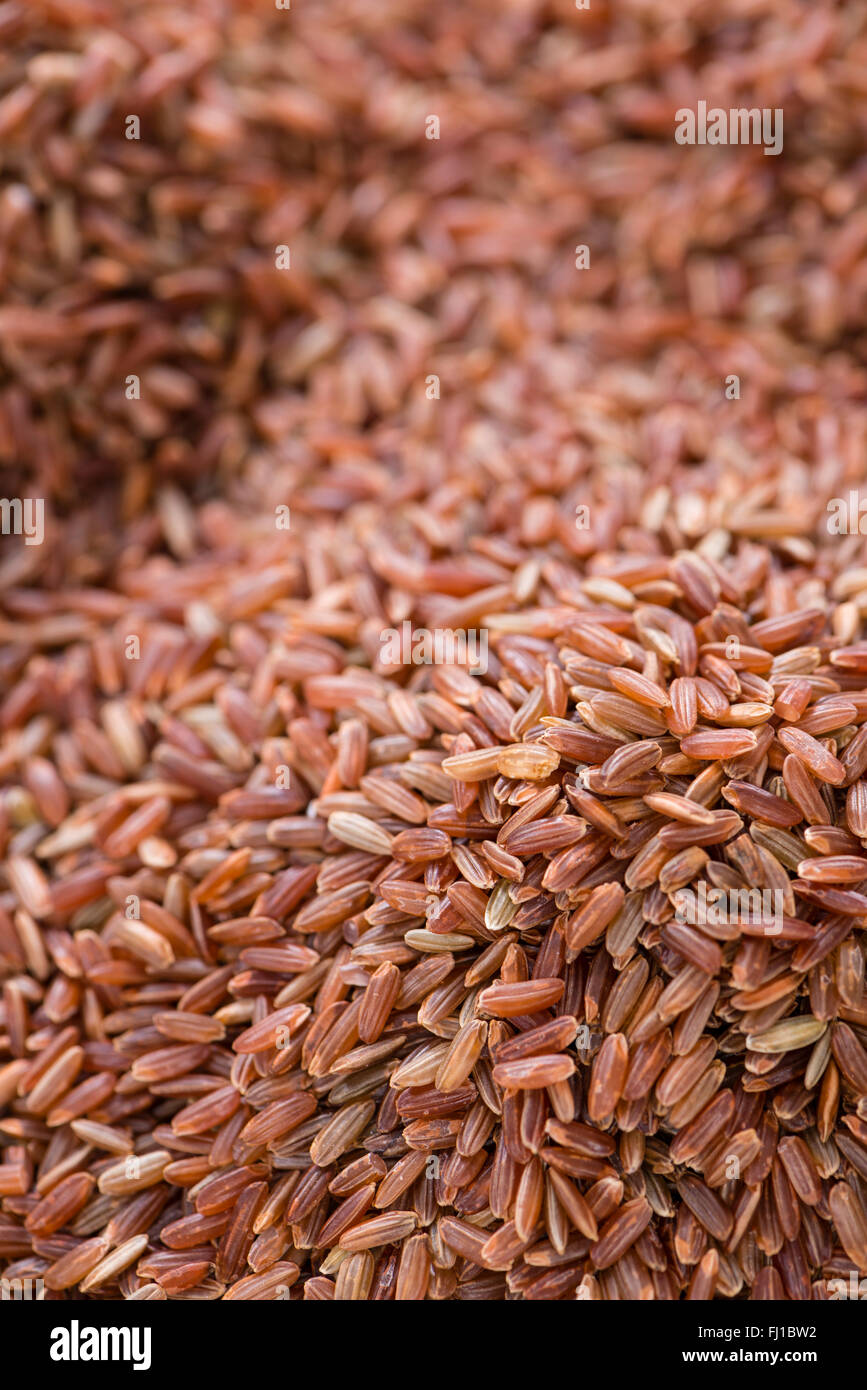Portion of red Rice as detailed close-up shot for use as background ...