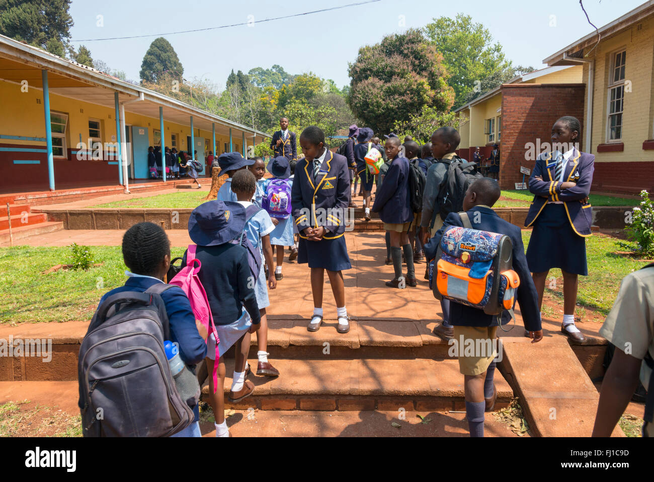 Rural school children walking africa hi-res stock photography and ...