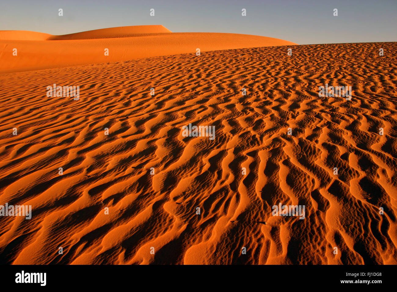 Chinguetti : landscape near city, desert with golden orange sands ...