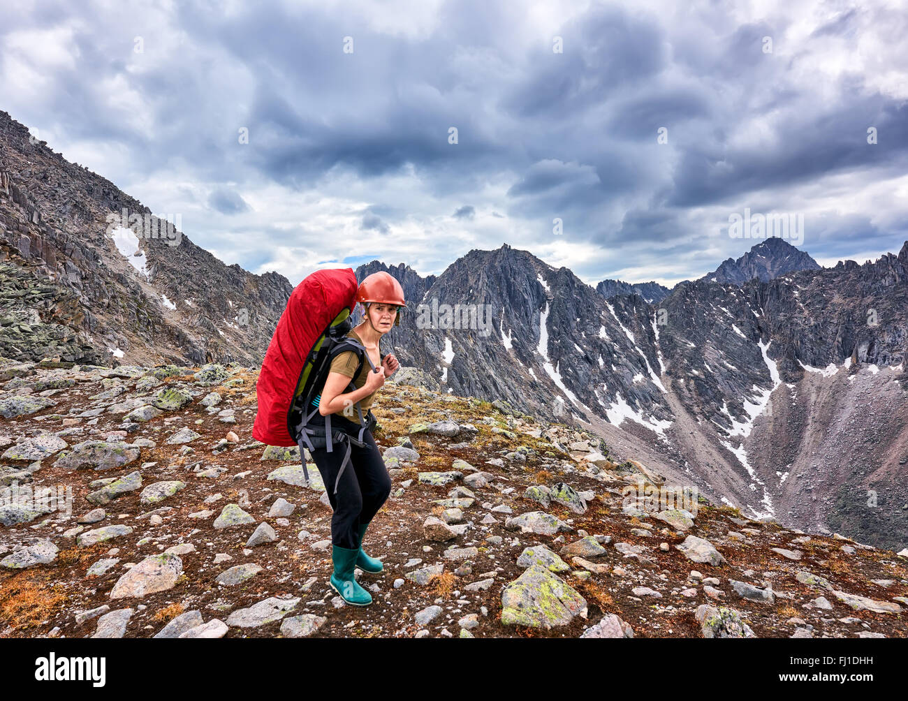 Hiking. Woman on pass . Eastern Sayan . Russia Stock Photo - Alamy