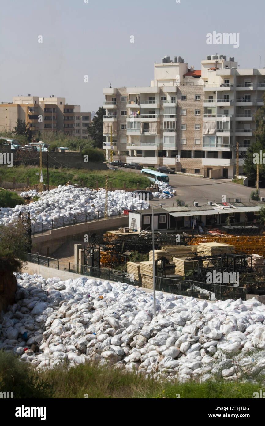Beirut, Lebanon. 28th February 2016. A pile waste bags builds up to ...