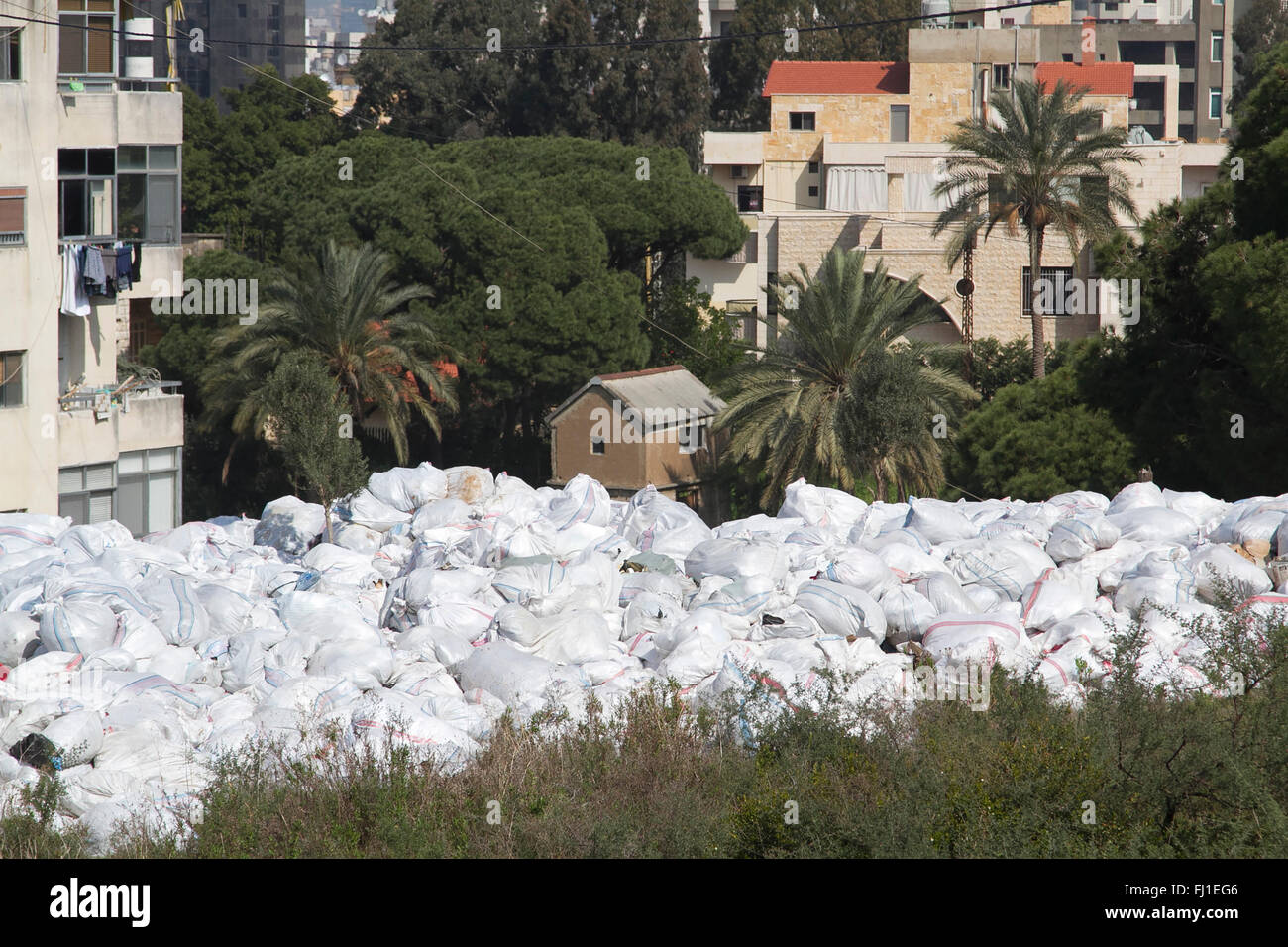 Beirut, Lebanon. 28th February 2016. A pile waste bags builds up to ...