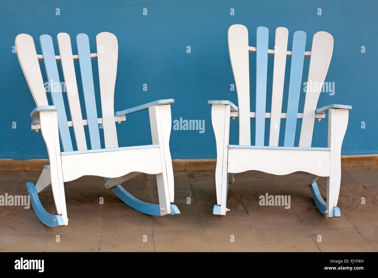 Blue and white traditional rocking chairs on porch at Vinales, Pinar ...