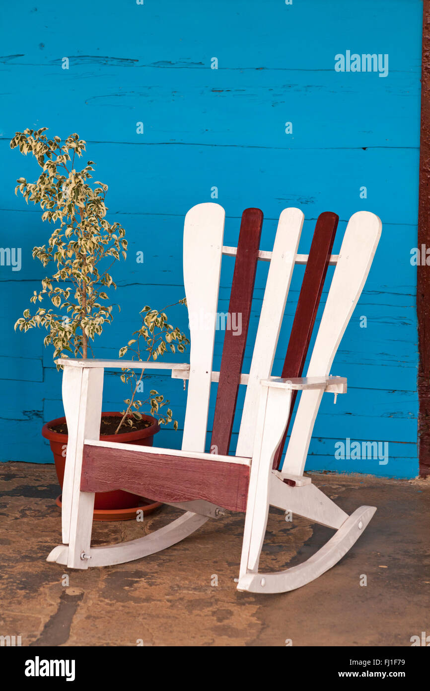 Traditional rocking chair and plant on porch at Vinales, Pinar del Rio ...