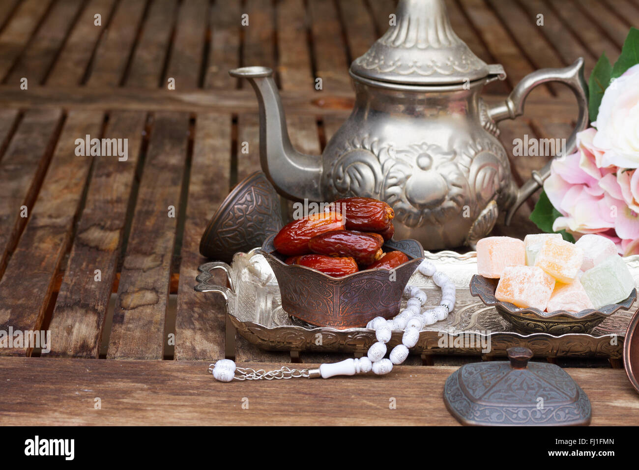 Date fruit with rosemary Stock Photo - Alamy