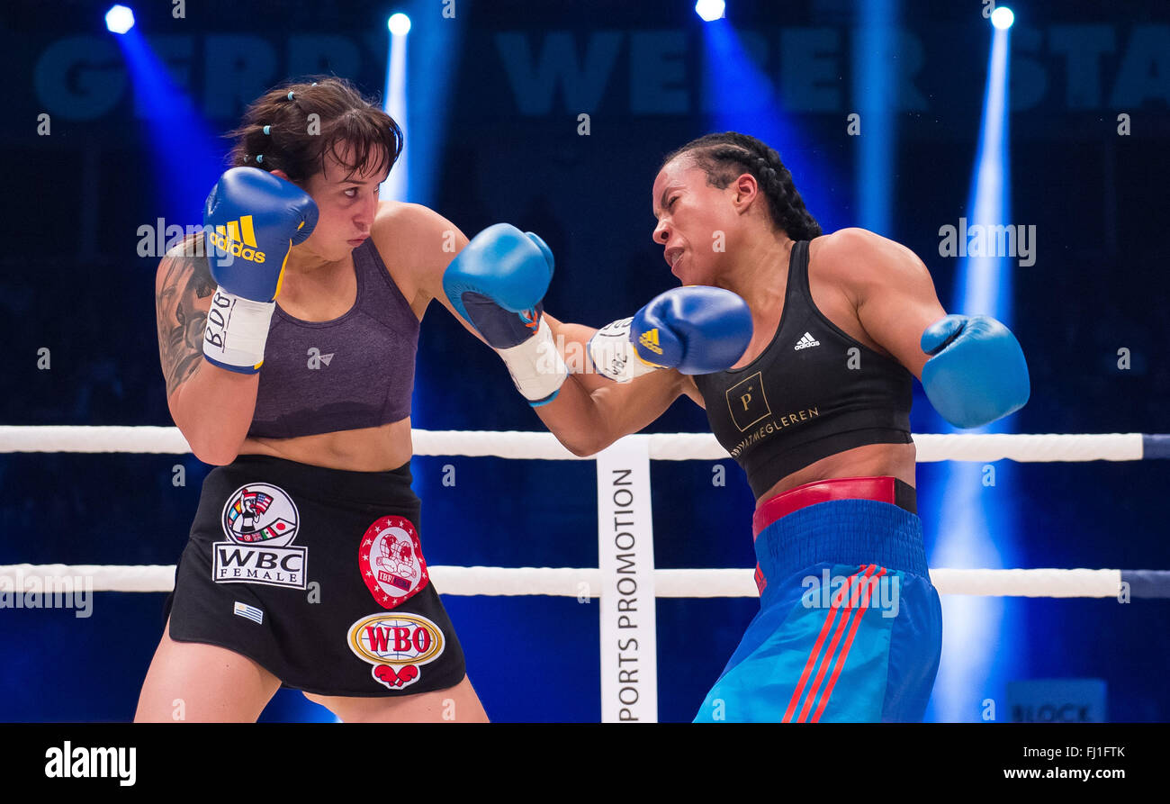 Halle, Germany. 21st Feb, 2016. Cecilia Braekhus (R, Norway) and Chris ...