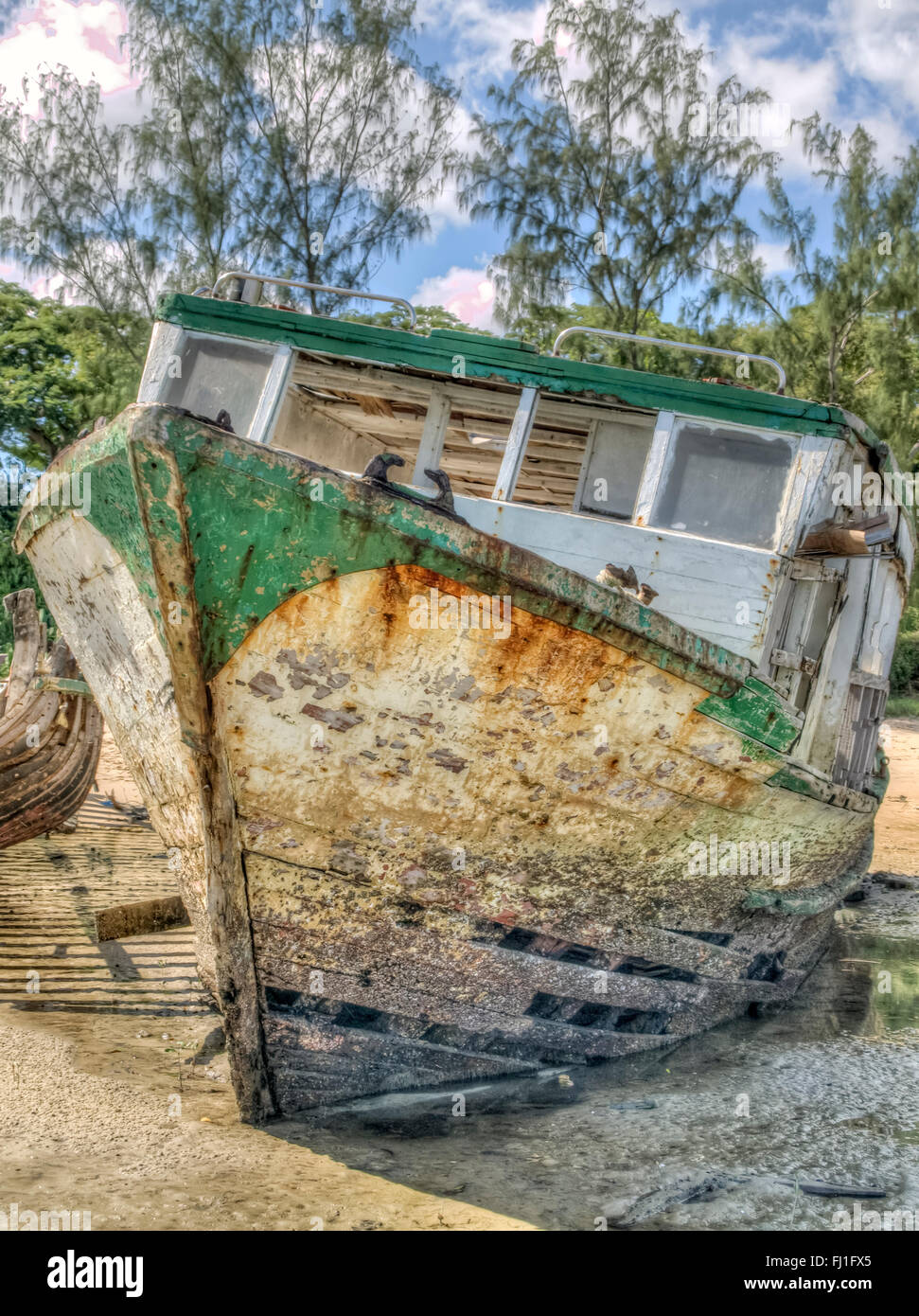 Inhambane Mozambique Dhow fishing boat grounded Stock Photo - Alamy