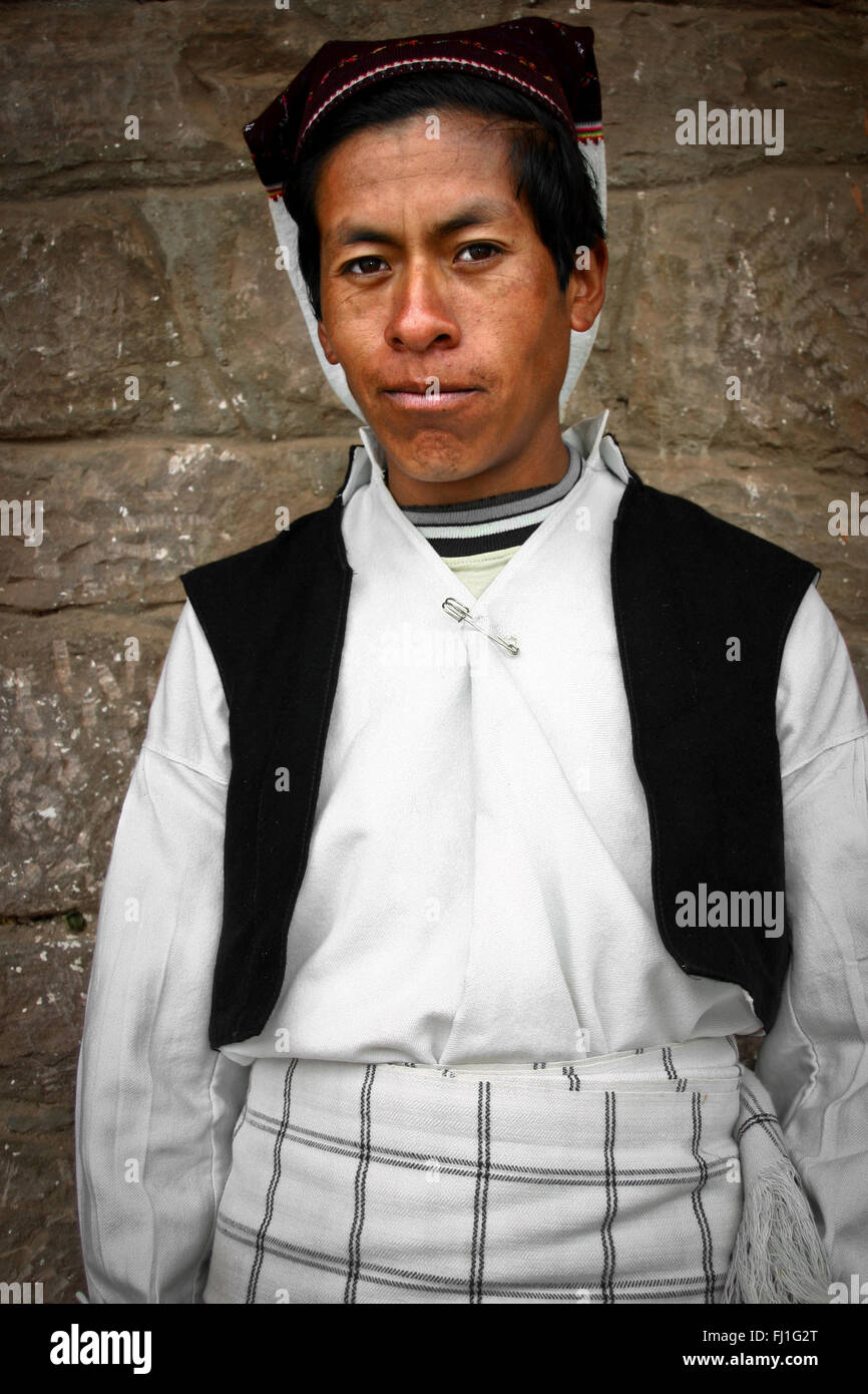 Portrait of man with traditional clothes on Isla Taquile , Peru Stock ...