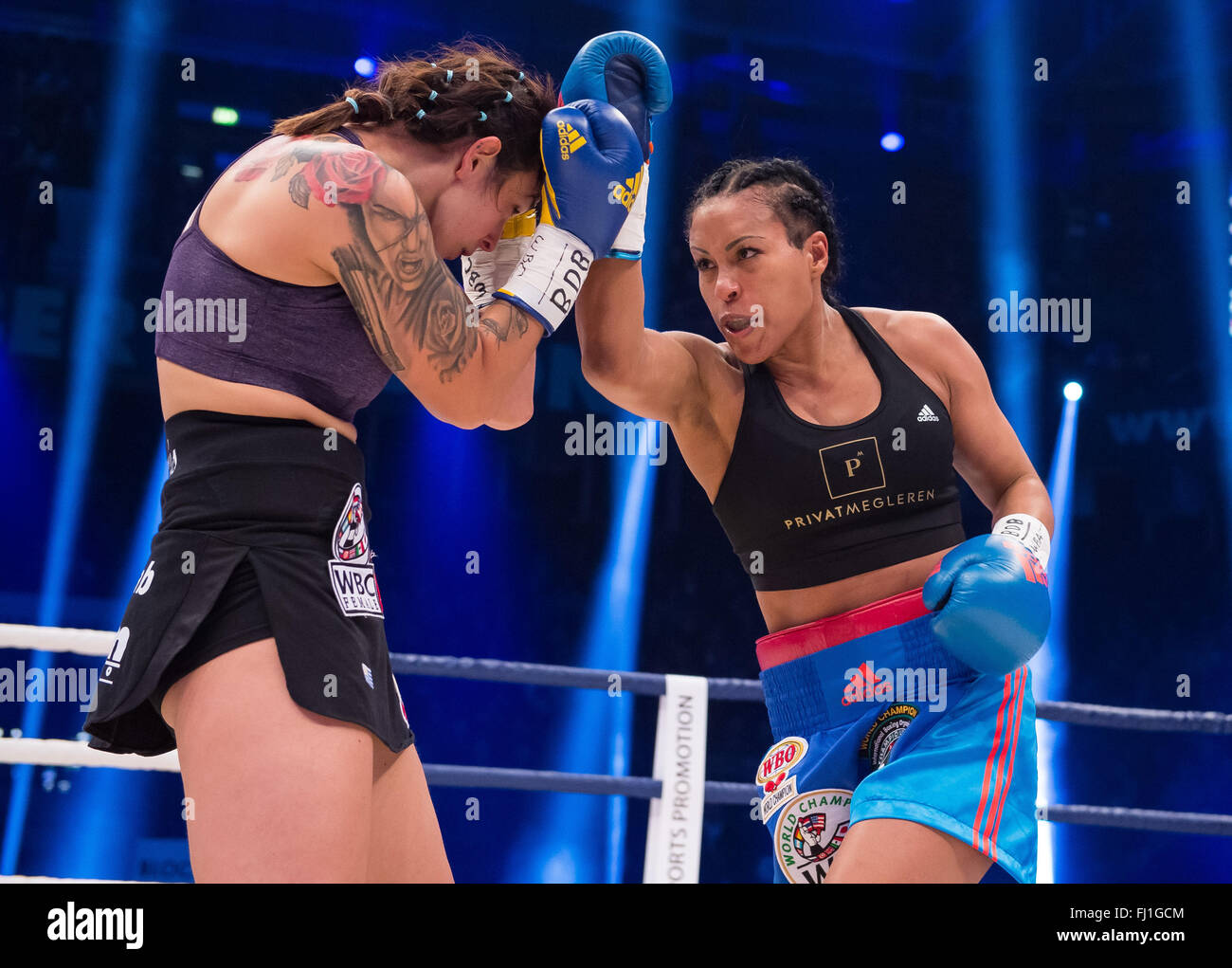 Halle, Germany. 21st Feb, 2016. Cecilia Braekhus (R, Norway) and Chris ...