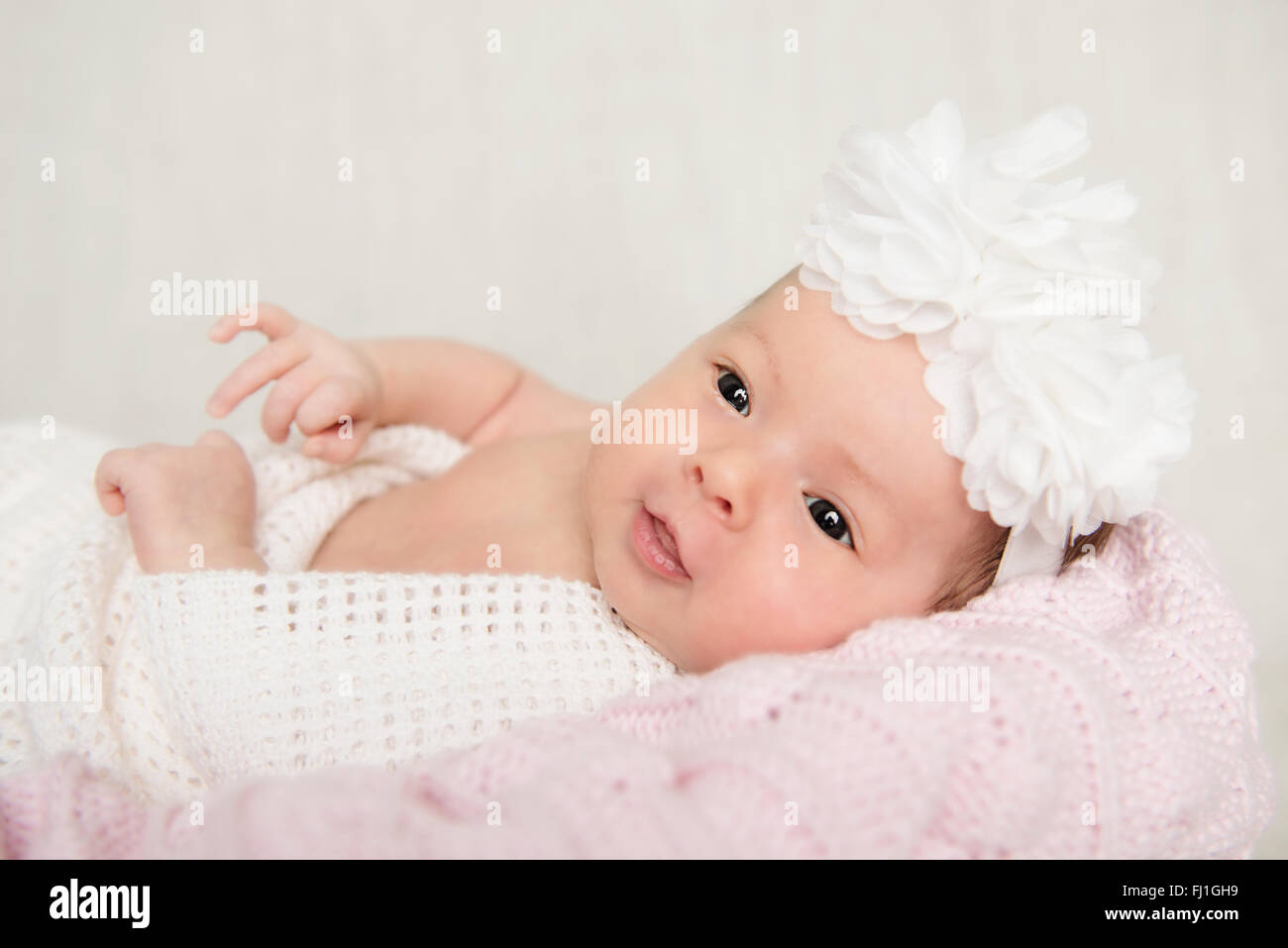 Baby newborn closeup face head girl cute hi-res stock photography and ...