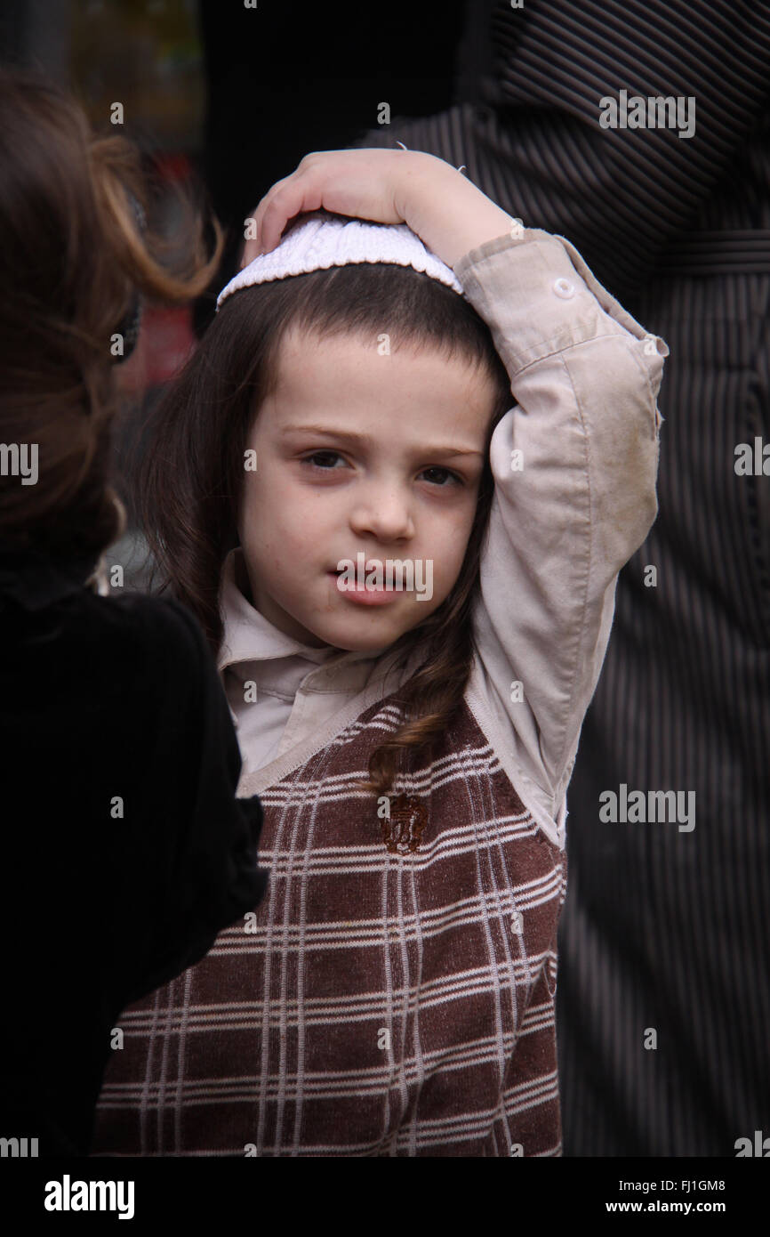 Jewish kid child wearing traditional kippa on Friday during Shabbat in ...