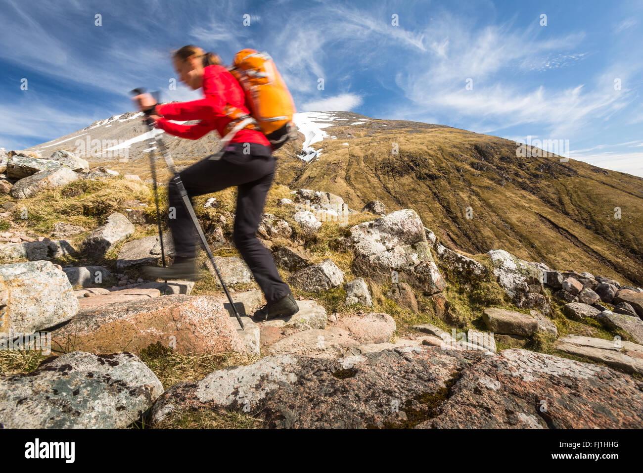 Pretty, young femalec going uphill Stock Photo - Alamy