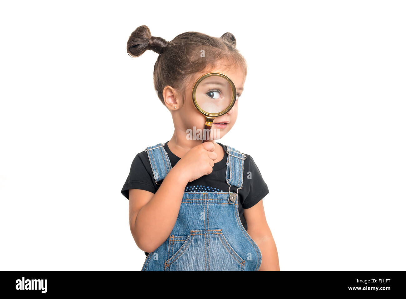 Cute baby girl looking through a magnifying glass.Isolated Stock Photo ...