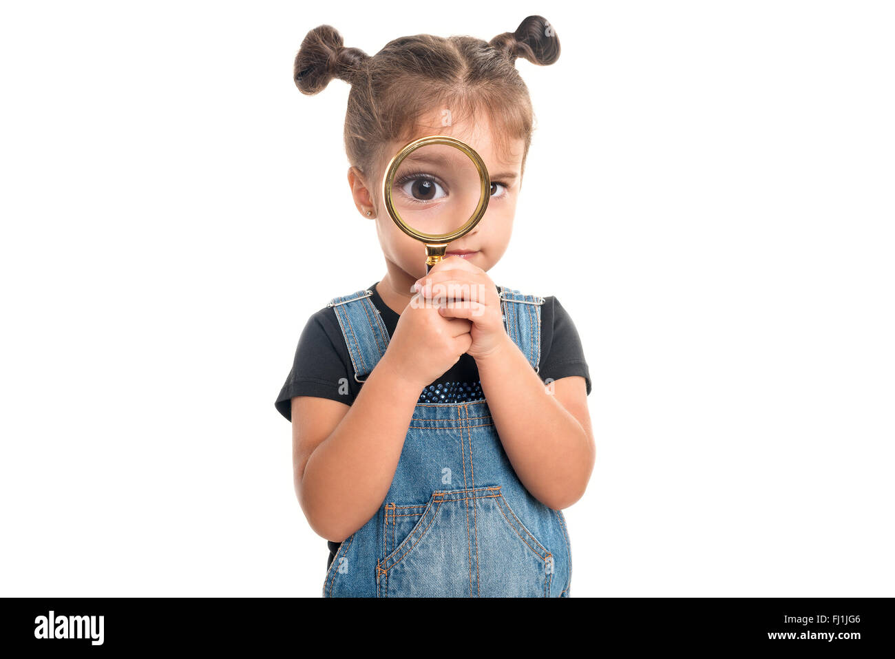 Cute baby girl looking through a magnifying glass.Isolated Stock Photo ...