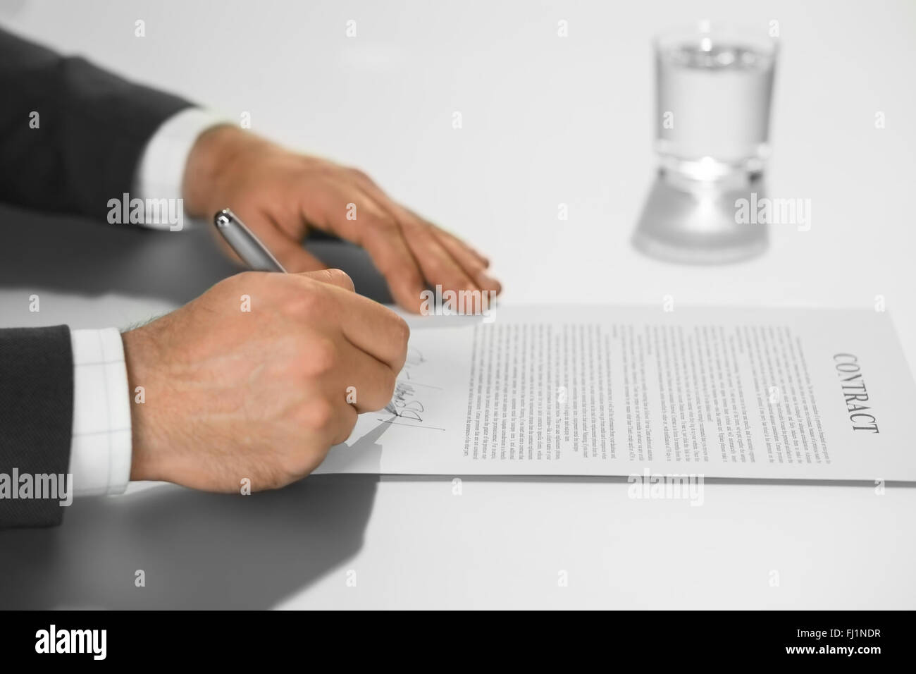 Boss puts his signature Stock Photo - Alamy