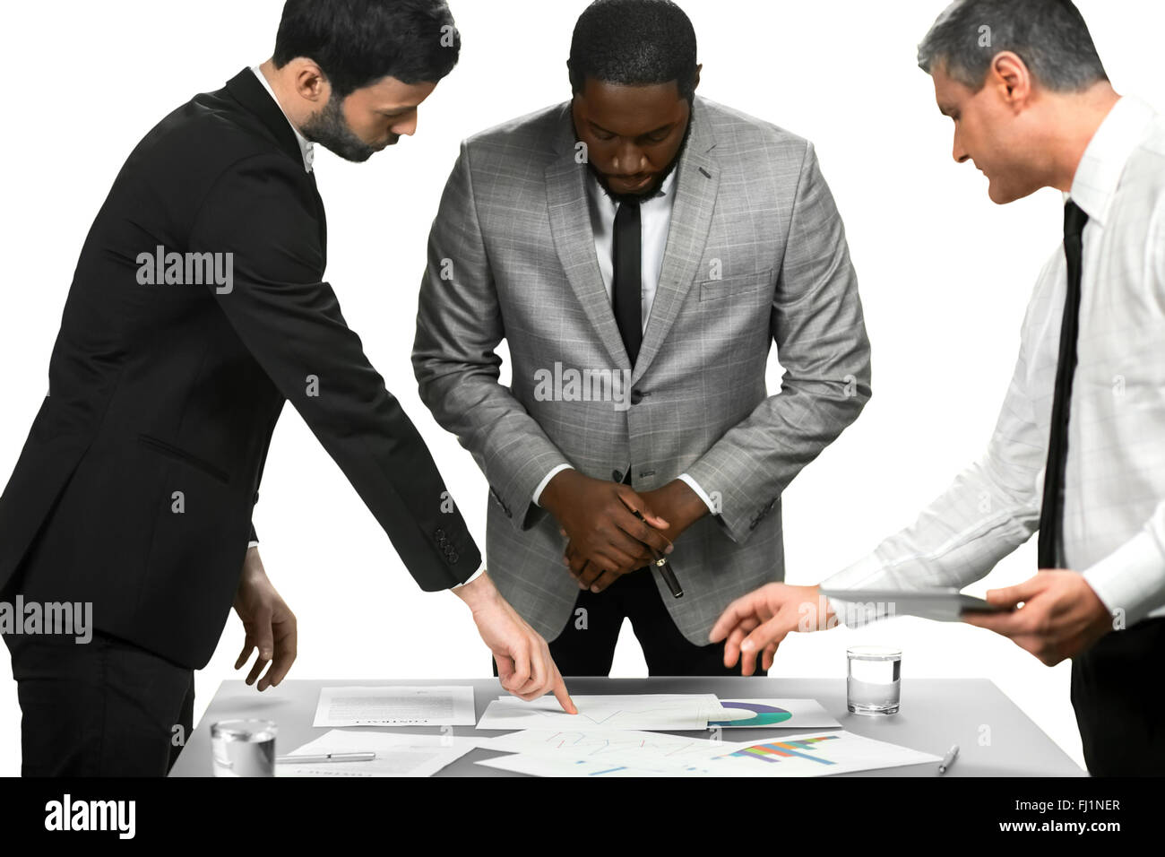 Business people looking project reports hi-res stock photography and ...