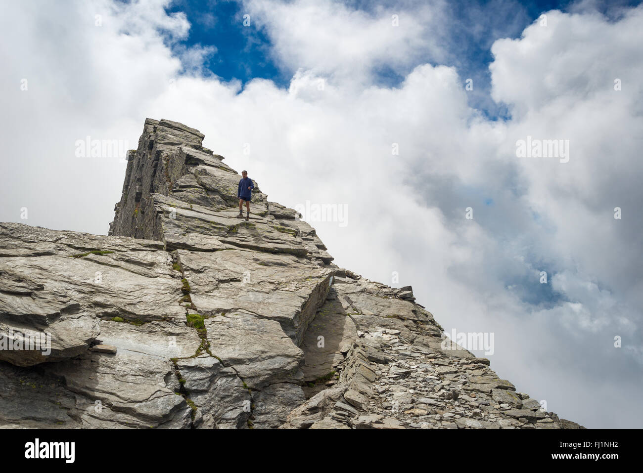Climbing on steep slope hi-res stock photography and images - Alamy