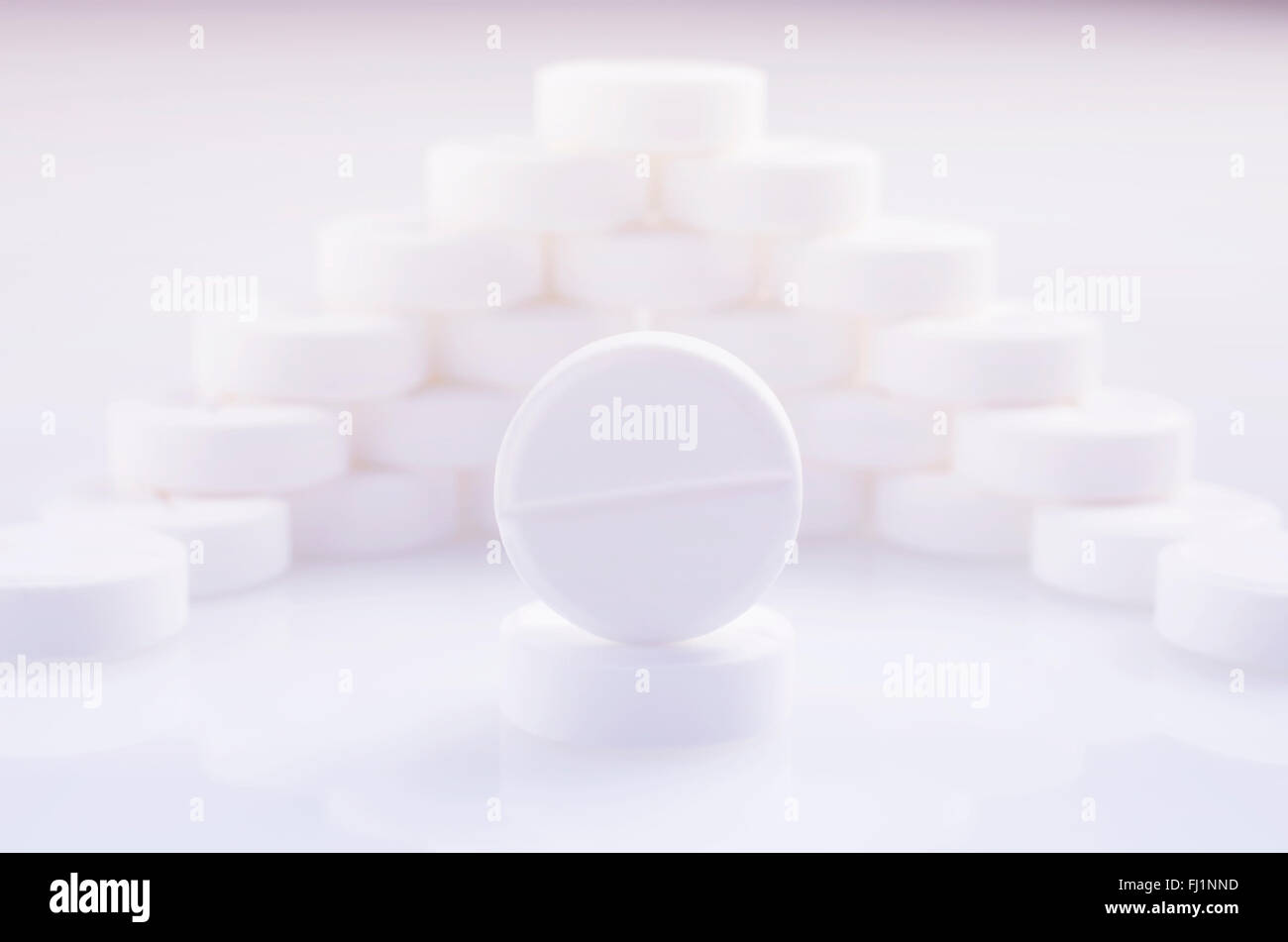 Wall of white tablets Stock Photo - Alamy