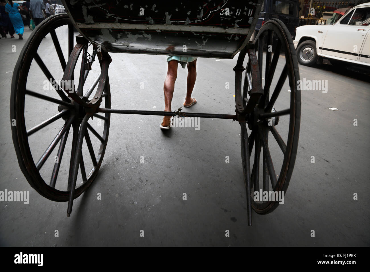 Rickshaw driver puller - hard work in Kolkata , India Stock Photo - Alamy