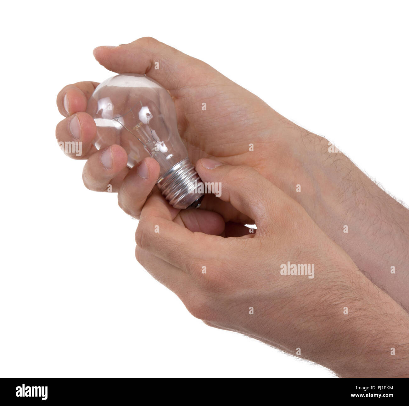 Hand holding an light bulb isolated on white background Stock Photo - Alamy