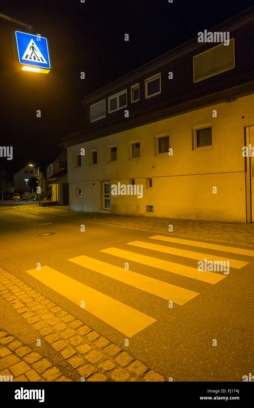 Pedestrian crossing in the night on a road Stock Photo - Alamy