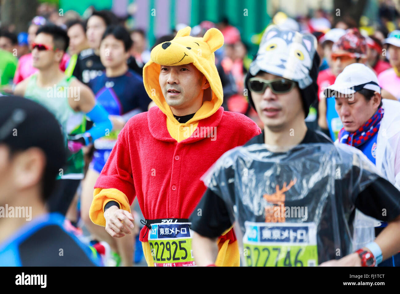 Tokyo, Japan. 28th Feb, 2016. Costumed runners take part in the Tokyo ...