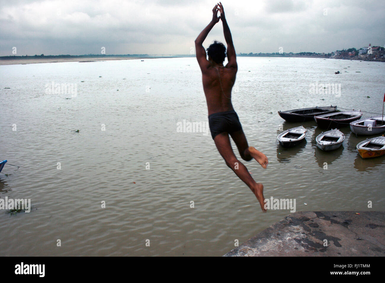 Indian man jumping hi-res stock photography and images - Alamy