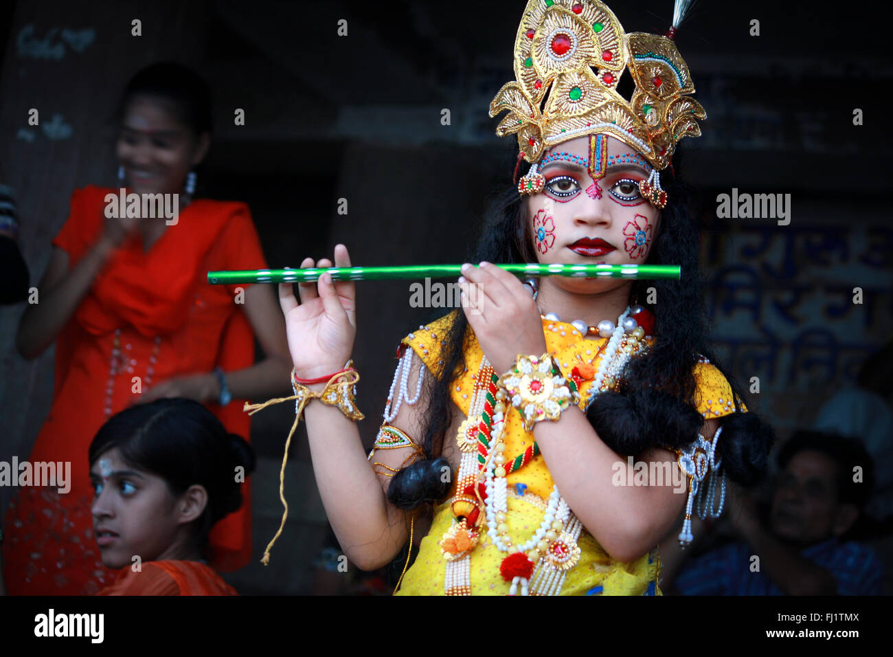 Hindu bou dresses as God Krishna in holy city Varanasi, India Stock ...