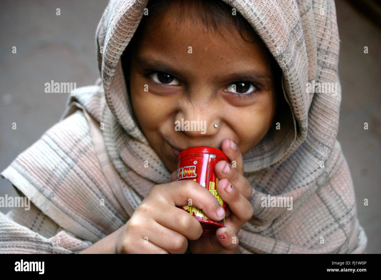 Beggar kid in Varanasi, India Stock Photo - Alamy