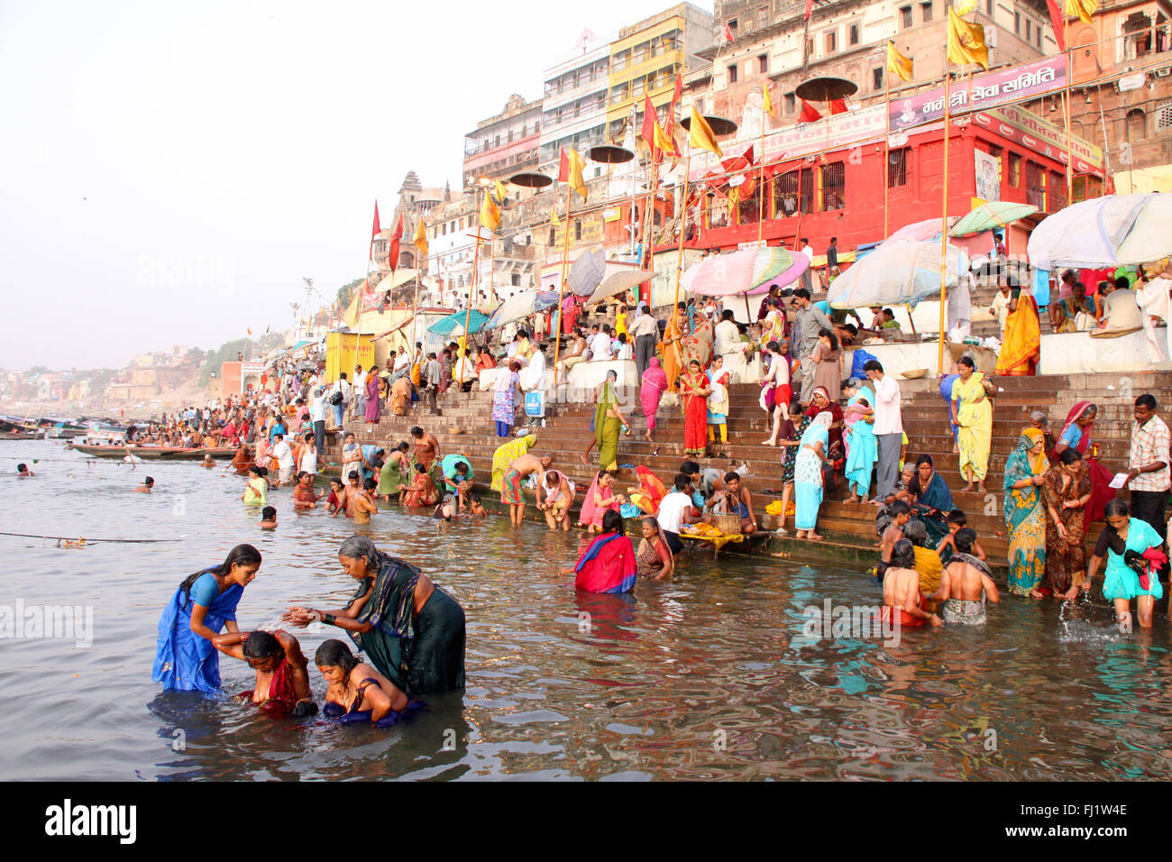 People on a ghat of Varanasi, on the banks of the Ganges, India Stock ...