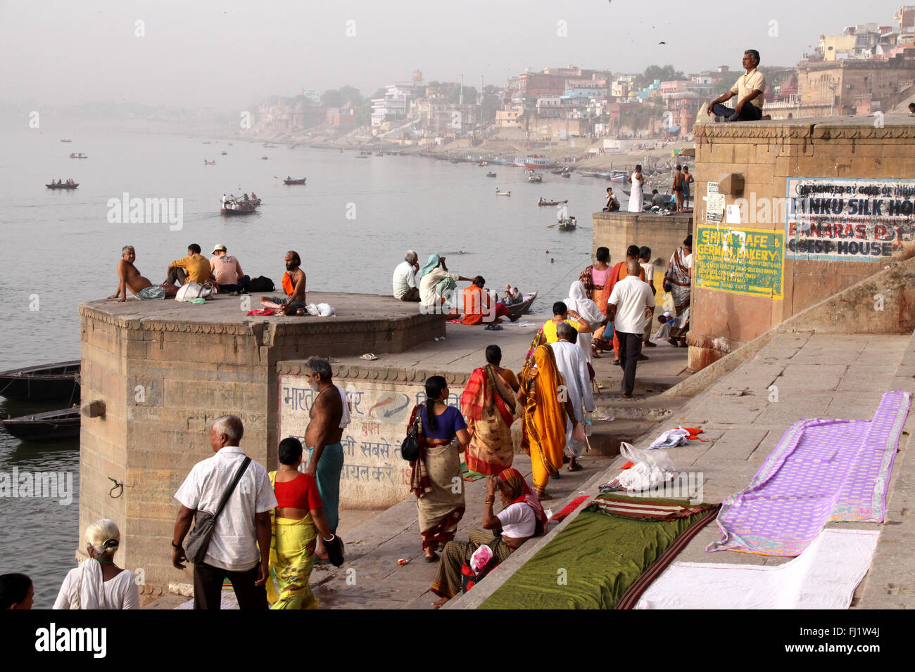 People on a ghat of Varanasi, on the banks of the Ganges, India Stock ...