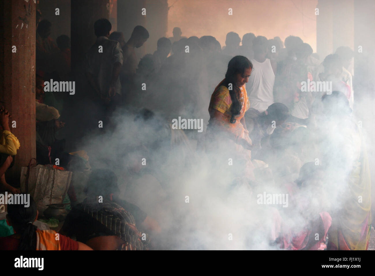 Crowd in the smoke on Varanasi ghat , India Stock Photo - Alamy