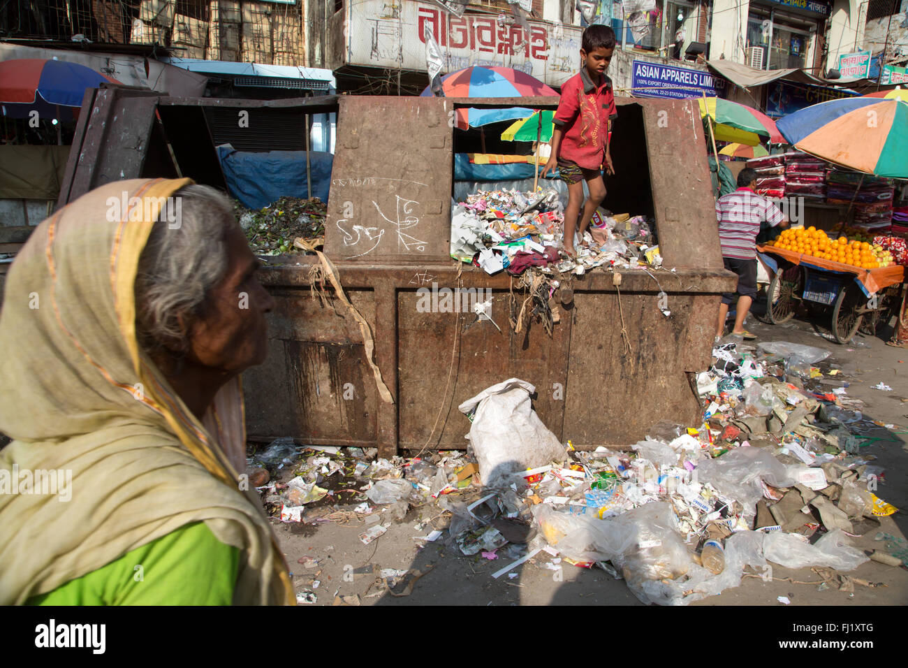 Poor kid searches in a garbage dump , Chittagong , Bangladesh Stock ...